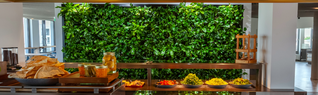 A healthy indoor climate in company canteen with living green wall